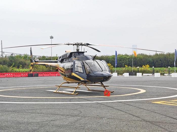 First low-altitude helicopter tour over Hangzhou's Qiantang River takes ...